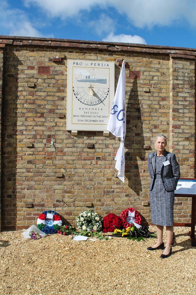 Wreaths and flowers laid by relatives at first memorial for 343 victims ...